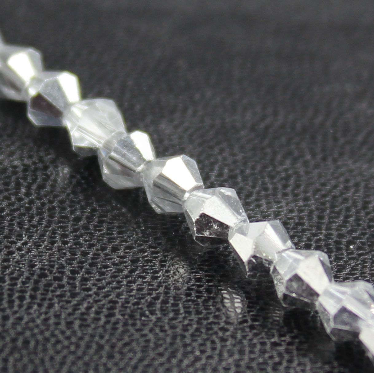 Chinese 4mm Bicone - Half Silver Coat - www.thesouthamptonbeadshop.co.uk